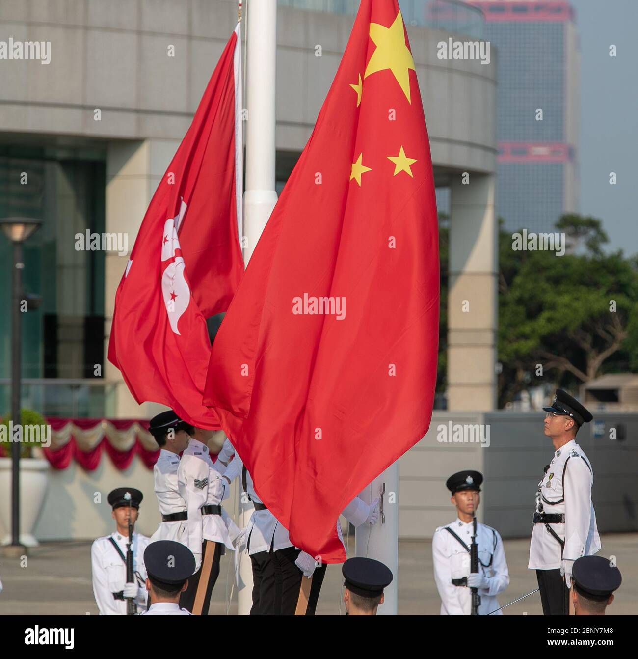 A national flag raising ceremony is held at the Golden Bauhinia Square ...