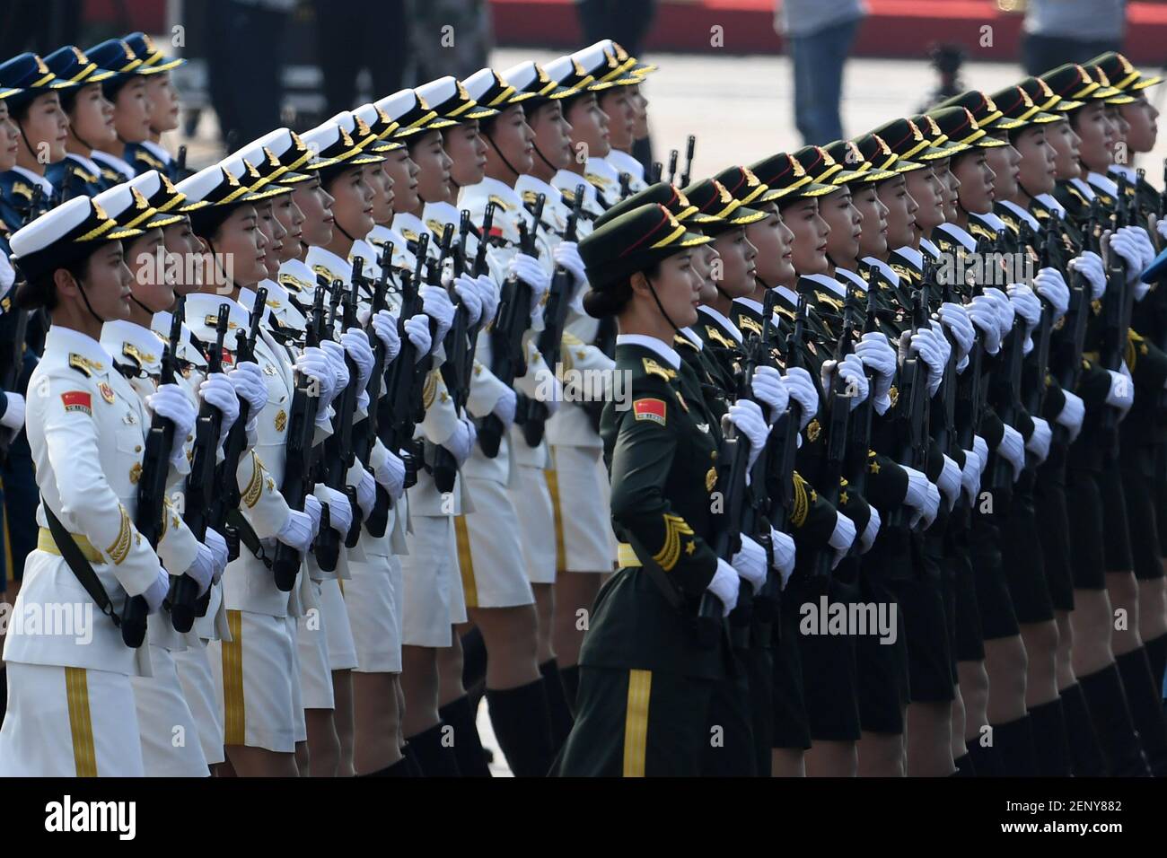 Soldiers, sailors and pilots of various troops line up and proceed ...