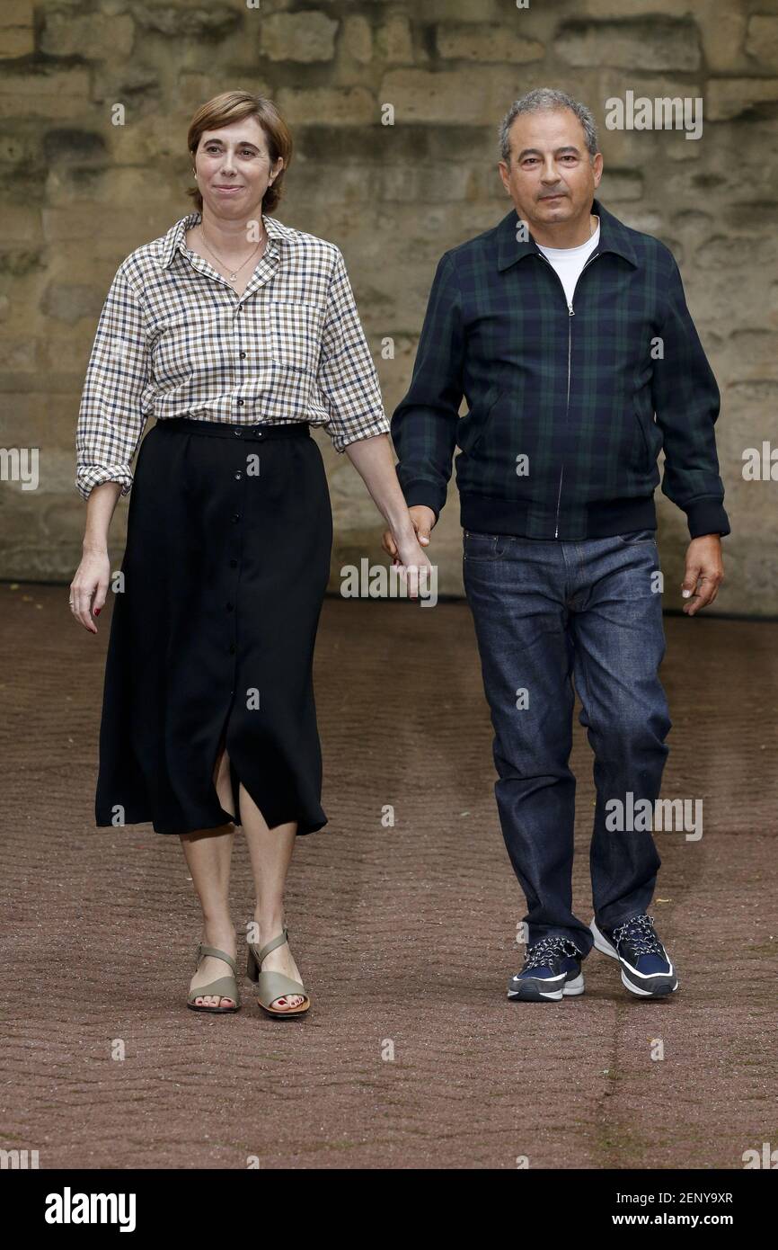 Judith Touitou and Jean Touitou walking on the runway during the A.P.C ...