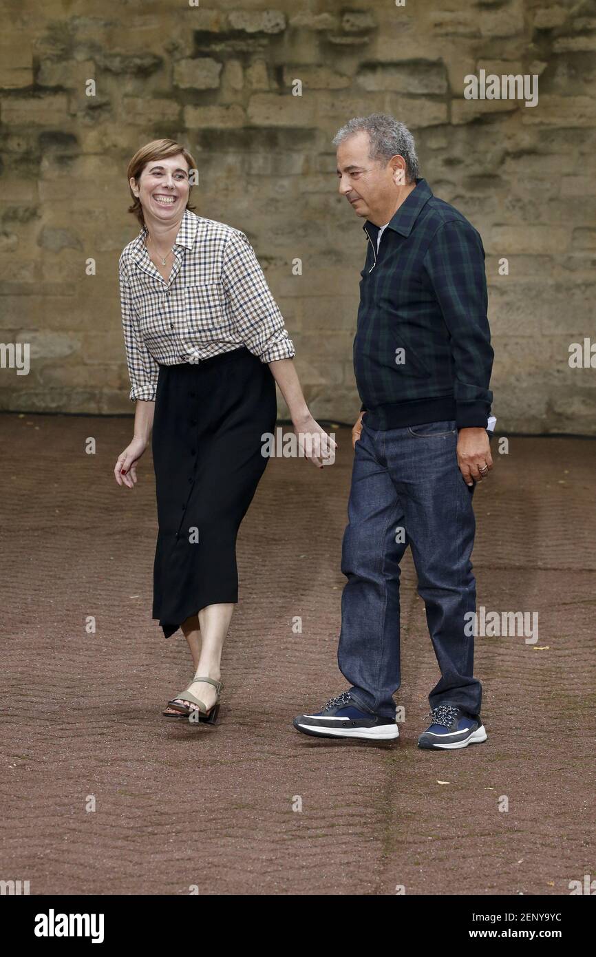 Judith Touitou and Jean Touitou walking on the runway during the A.P.C ...