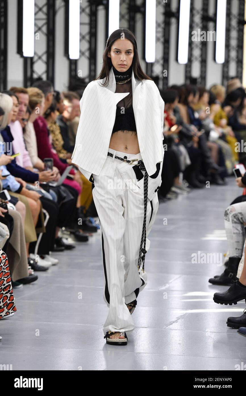 Model Ali Morgan walking on the runway during the Sacai Ready to Wear ...