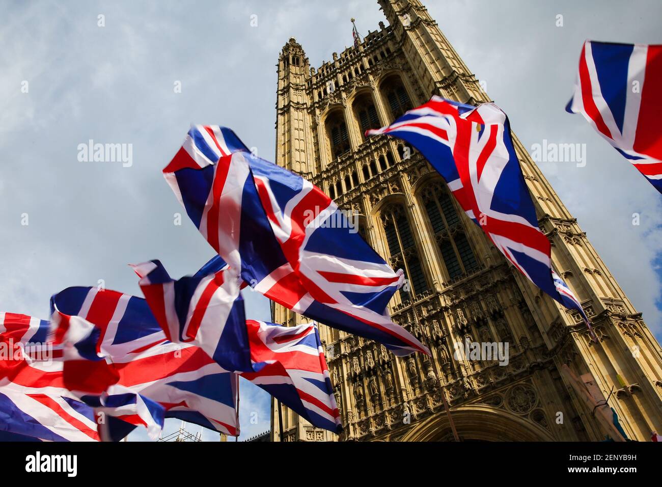Union Jack flags fluttering outside Houses of Parliament in Westminster ...