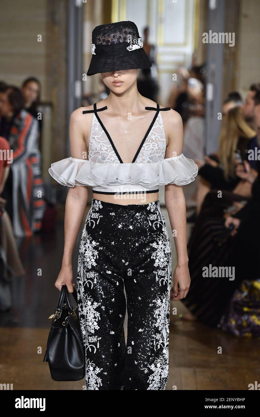 Model Chu Wong walking on the runway during the Giambattista Valli ...