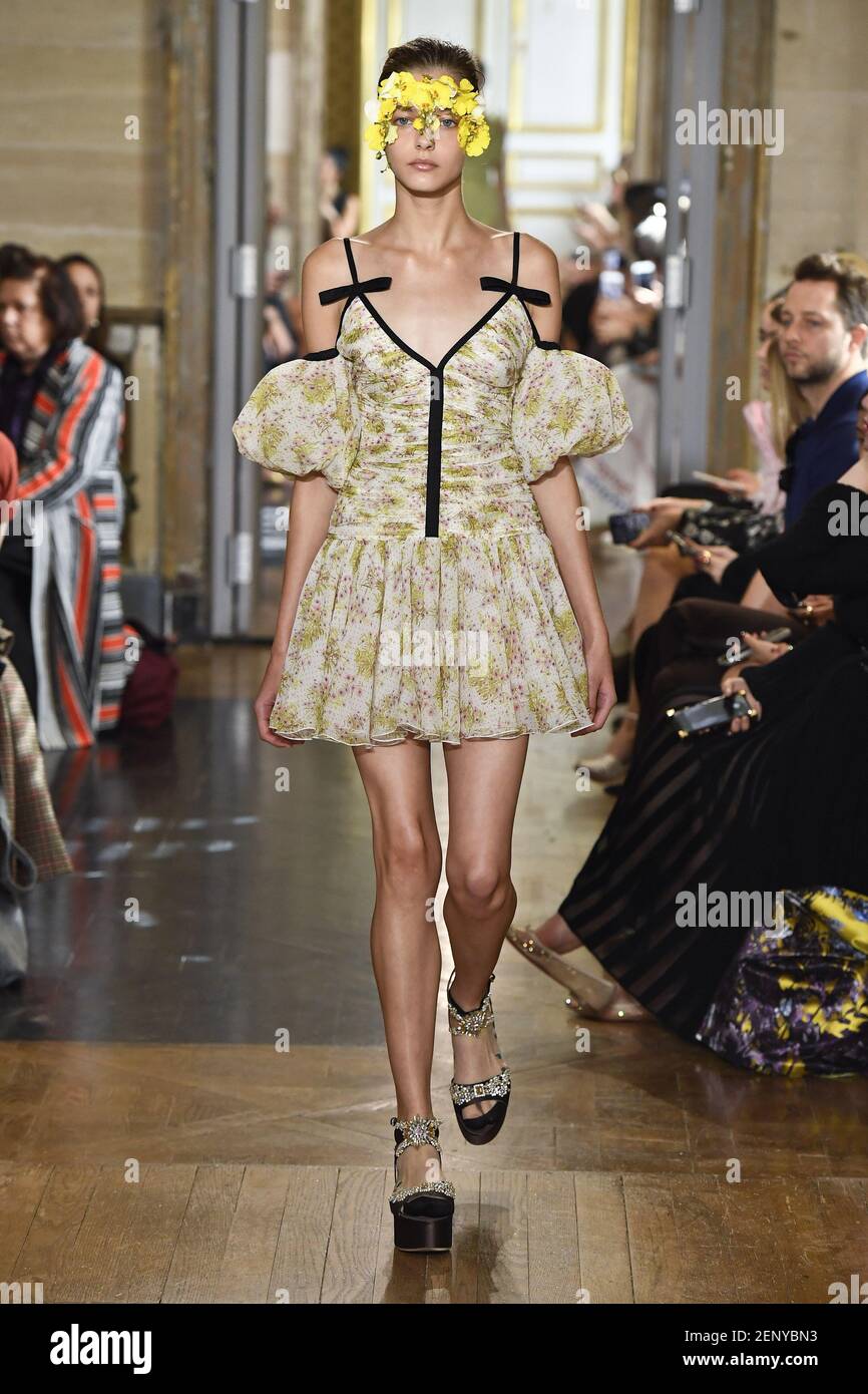 Model Liza Popova walking on the runway during the Giambattista Valli ...