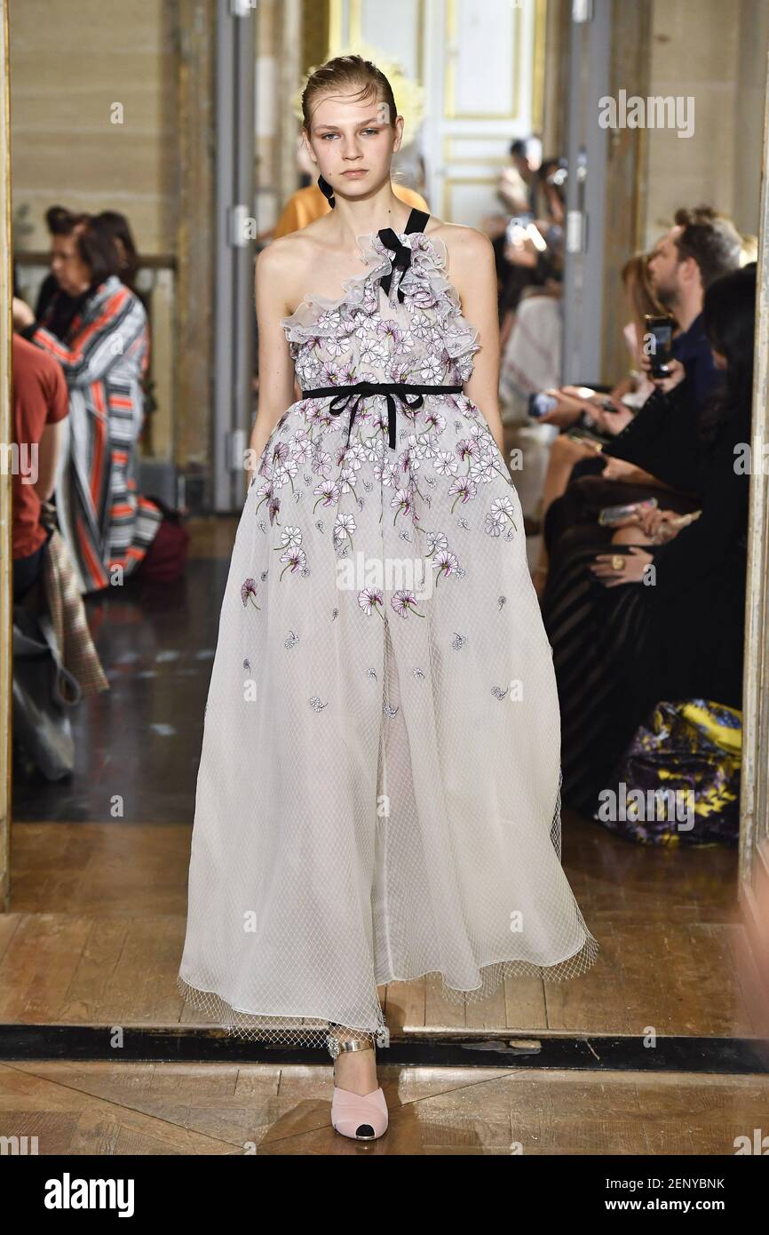 Model Deirdre Fírinne walking on the runway during the Giambattista ...