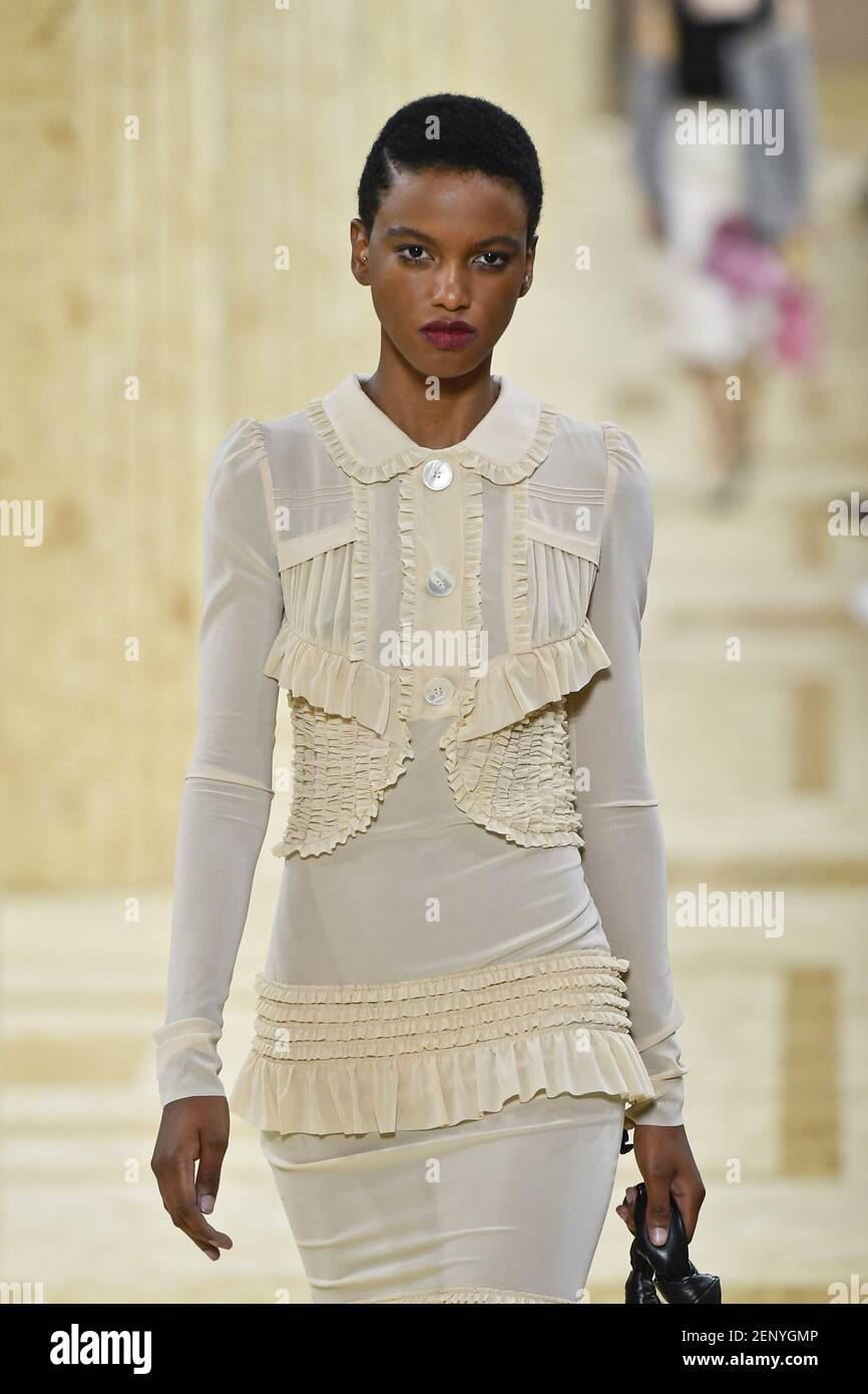 Model Ana Barbosa walking on the runway during the Miu Miu Ready to ...