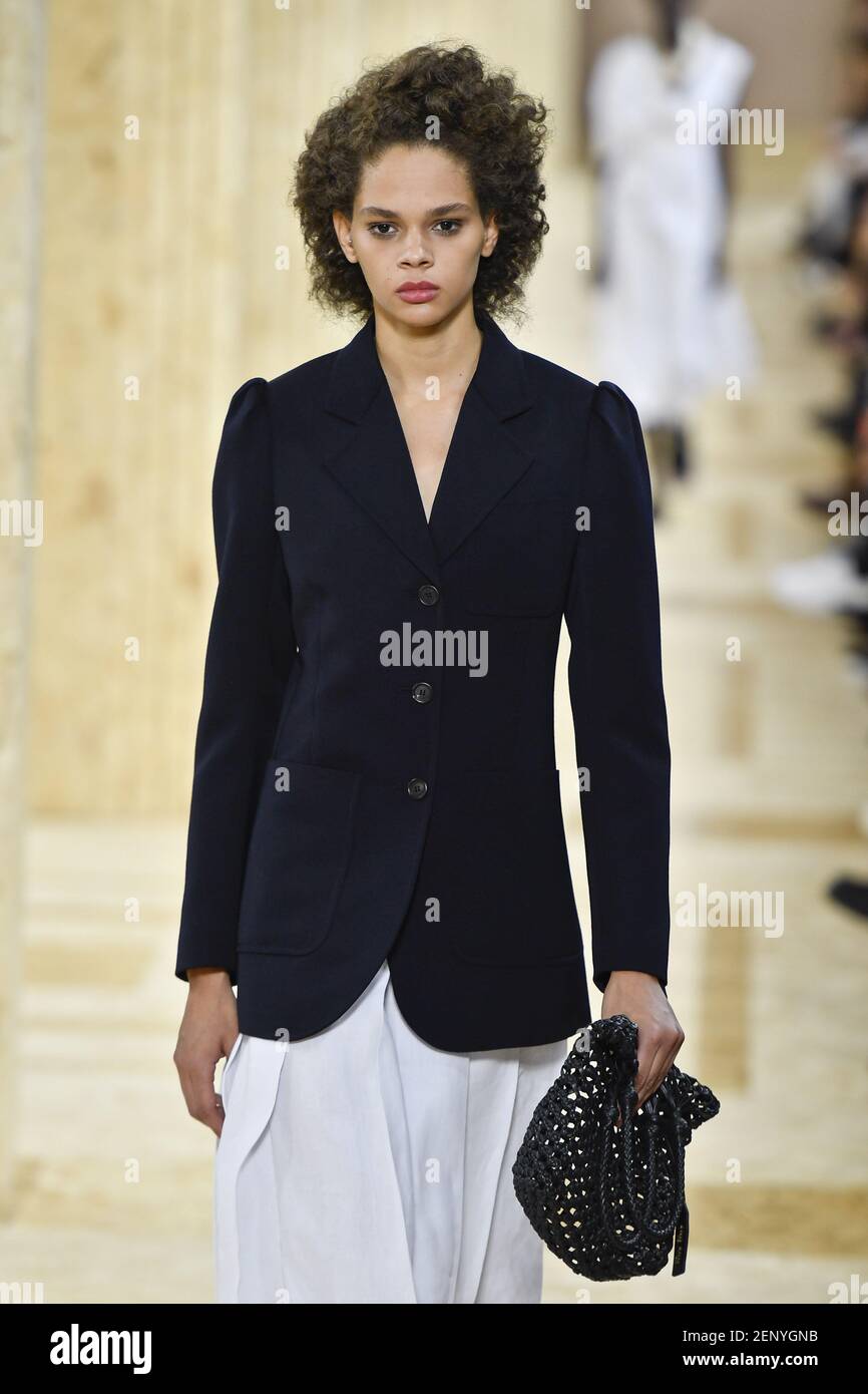 Model Hiandra Martinez walking on the runway during the Miu Miu Ready ...