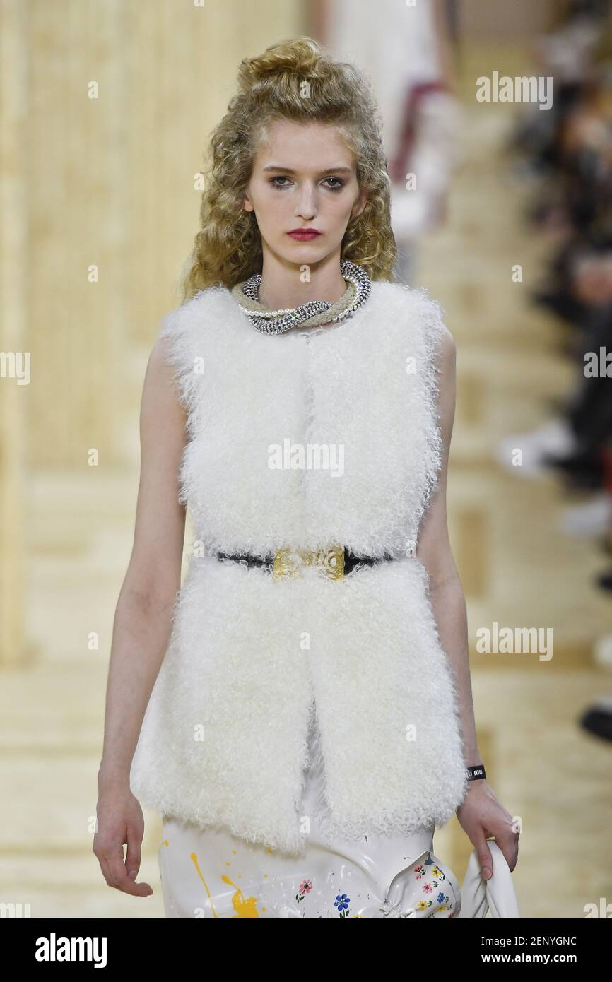 Model Mia Brammer walking on the runway during the Miu Miu Ready to ...