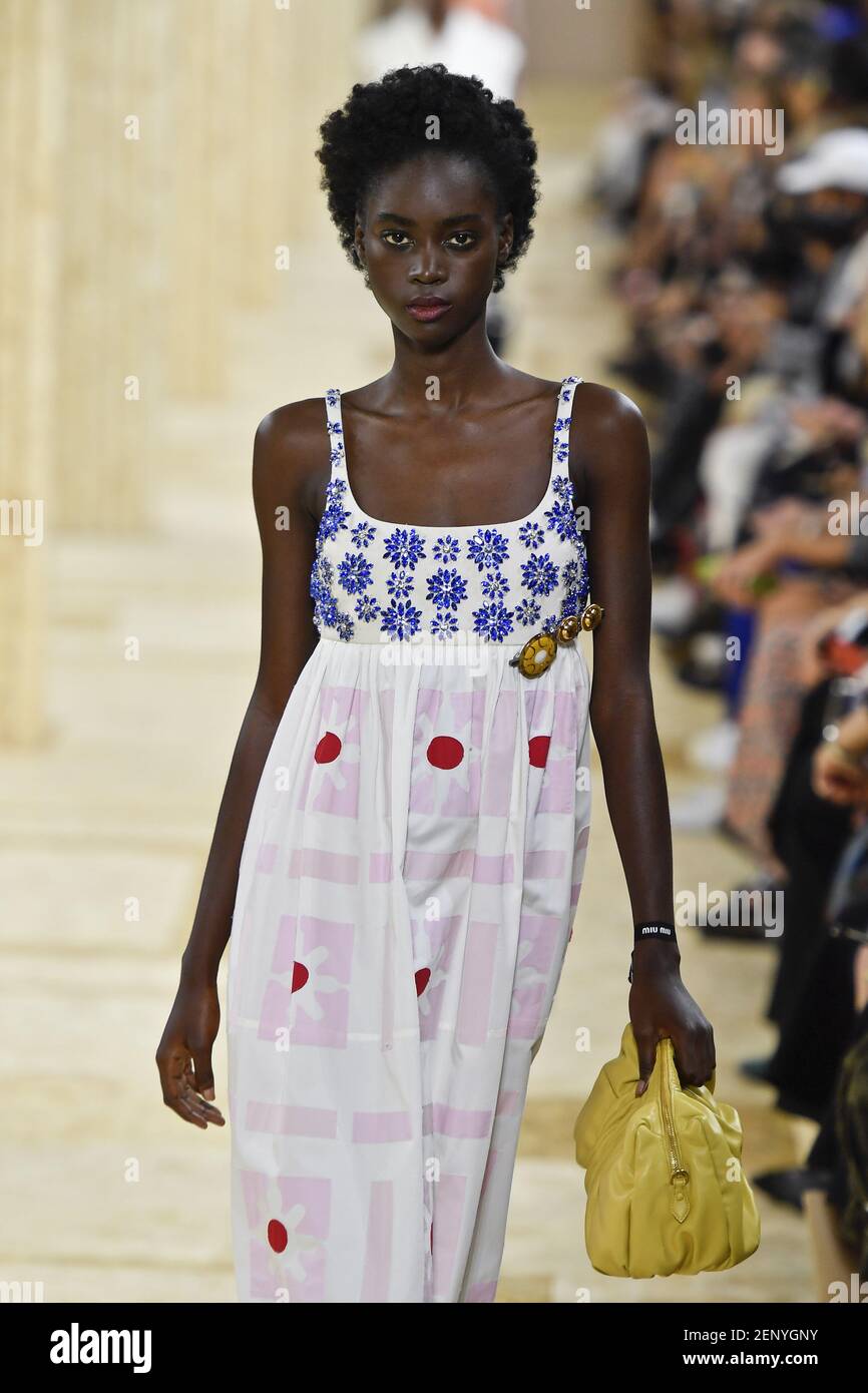 Model Tomiwa walking on the runway during the Miu Miu Ready to Wear ...