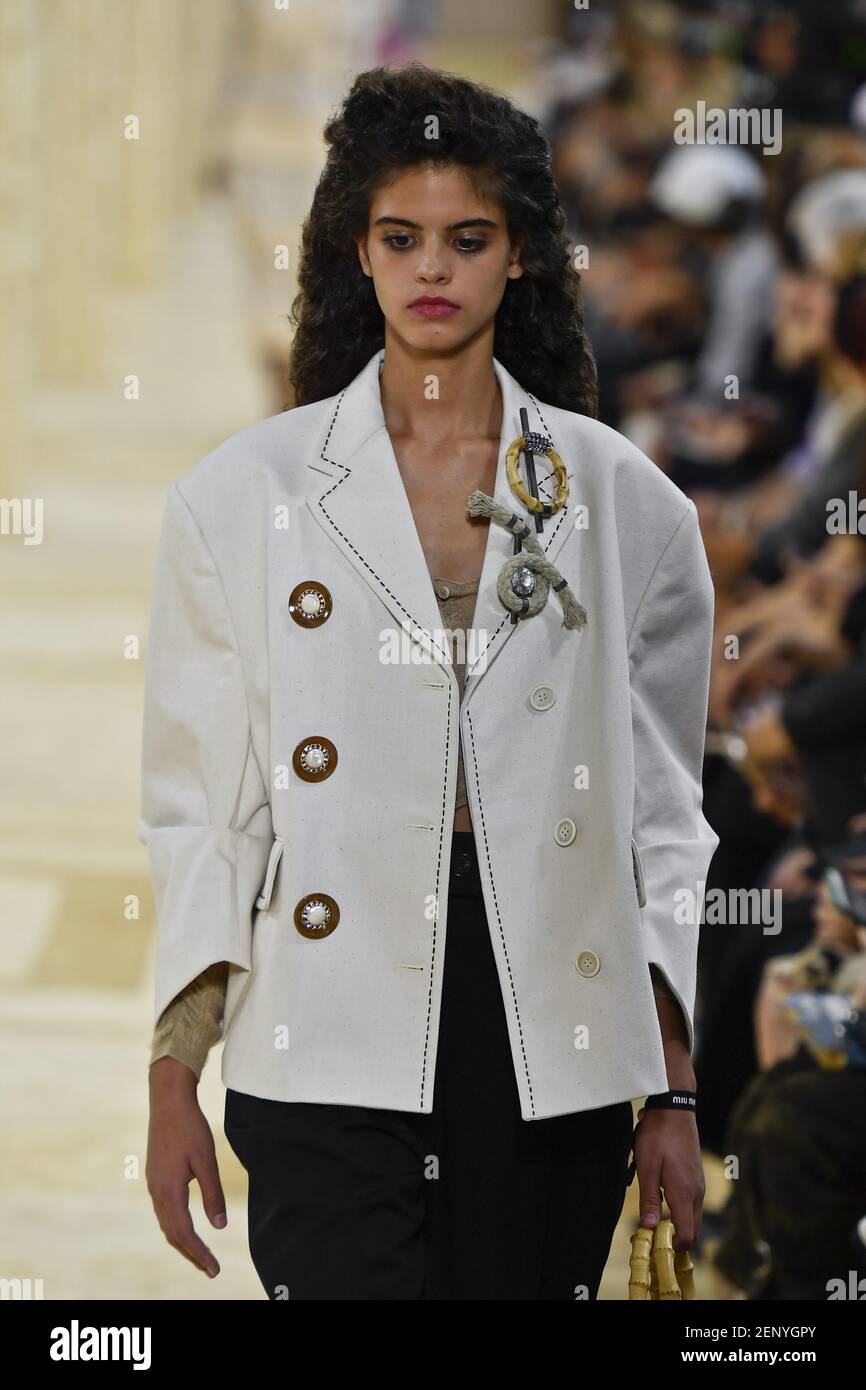 Model Hannah McNeil walking on the runway during the Miu Miu Ready to ...