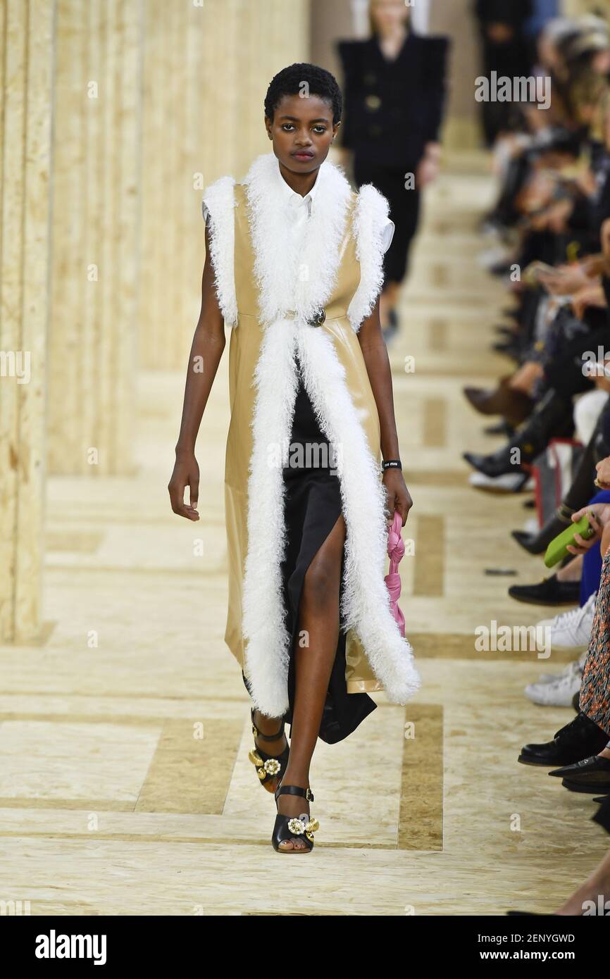 Model Elizabeth Ayodele walking on the runway during the Miu Miu Ready ...