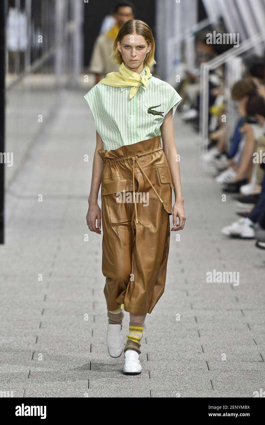 Model Emily Driver walking on the runway during the Lacoste Ready to ...