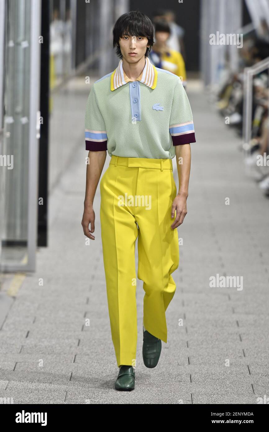 Model Meng Yuqi walking on the runway during the Lacoste Ready to Wear ...