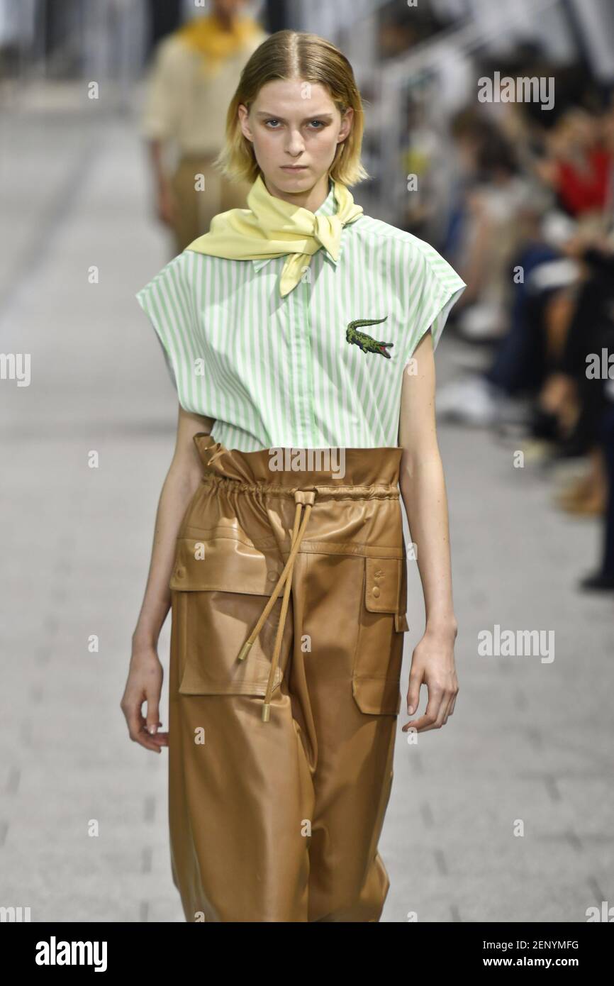Model Emily Driver walking on the runway during the Lacoste Ready to ...
