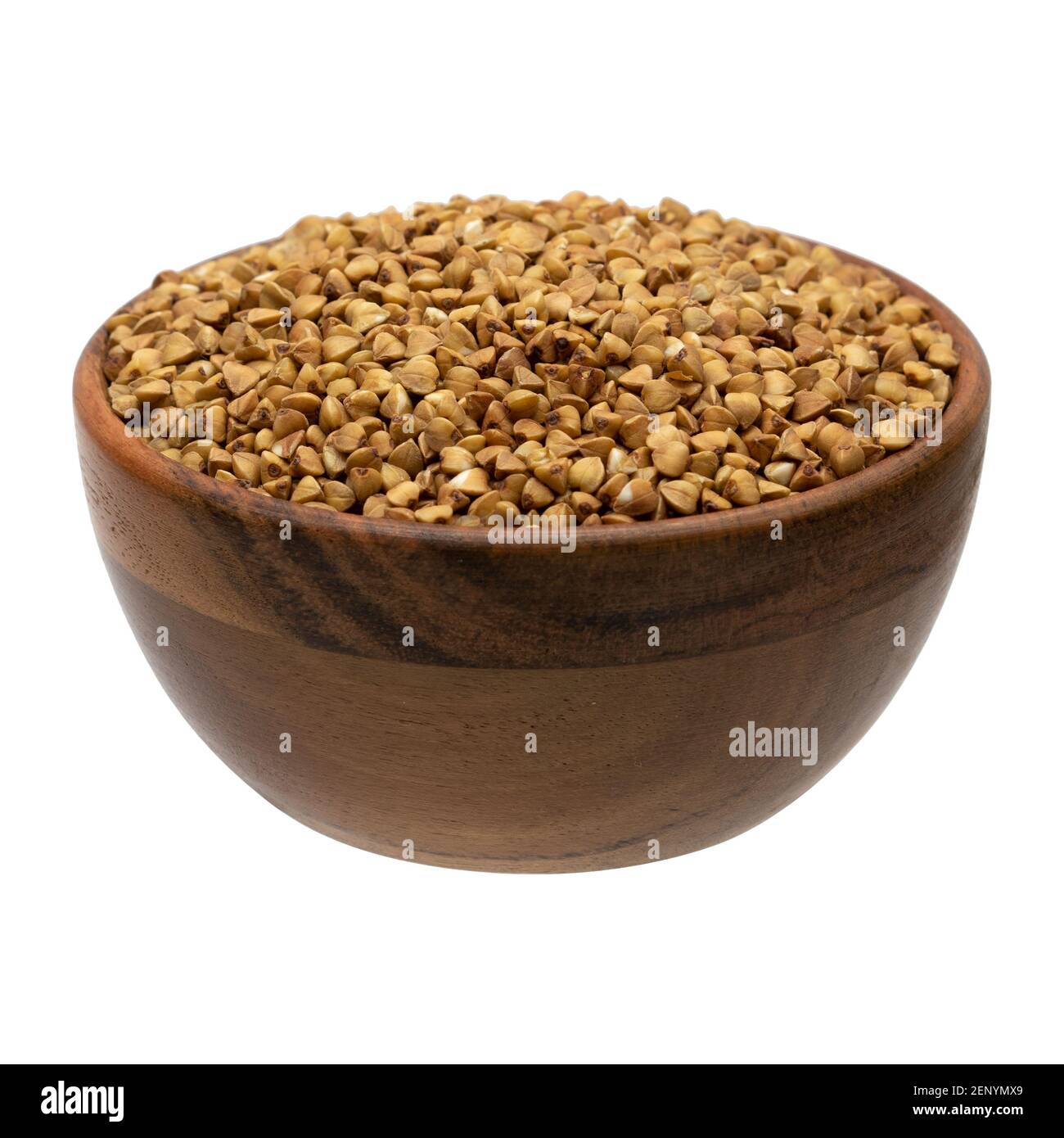 Uncooked buckwheat in wooden bowl isolated on white background Stock ...