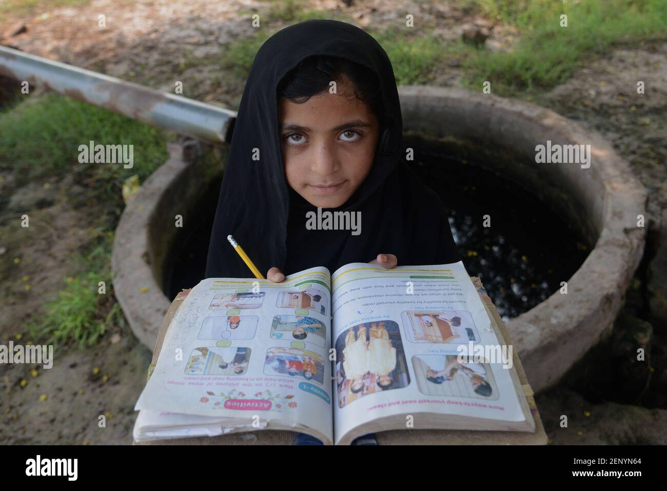 Pakistani teachers teach students at Government Primary School Mozia ...