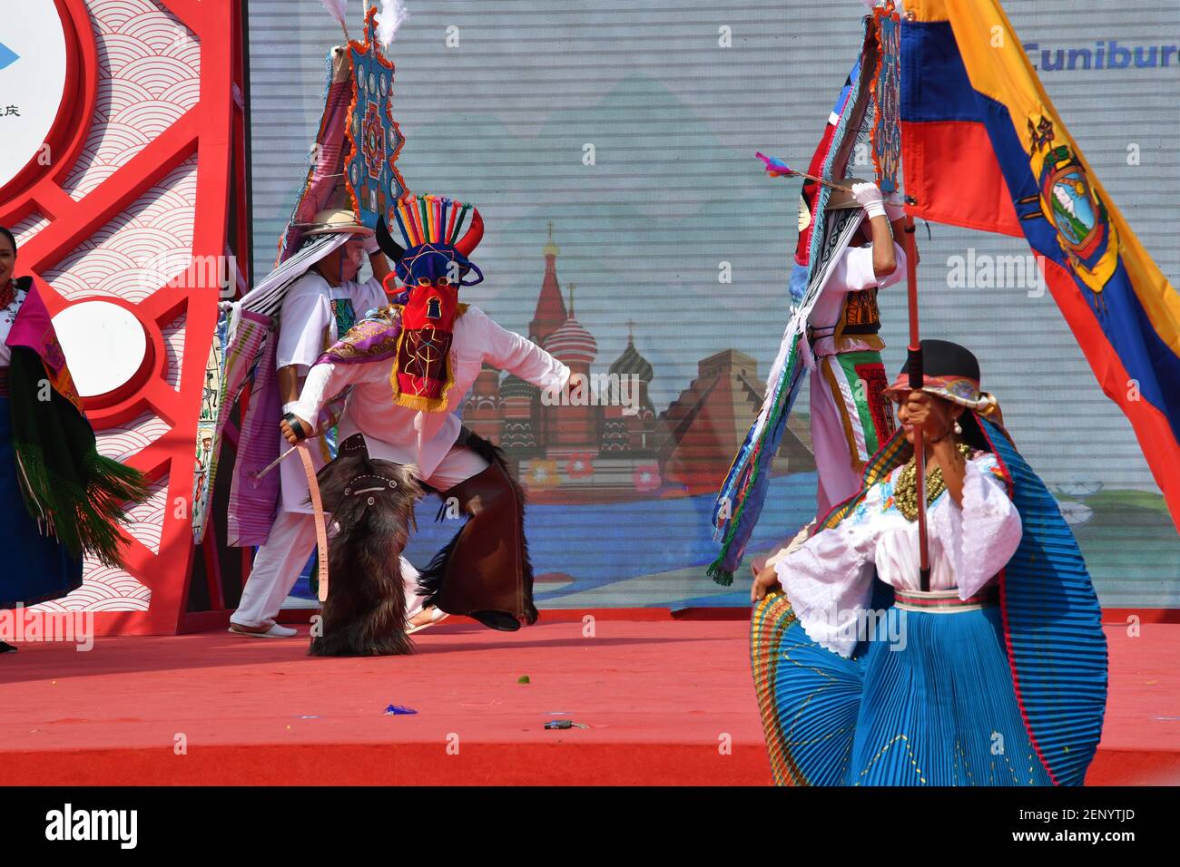 Ecuadorian artisits of Cuniburo Cultura dressed up in dance customes ...