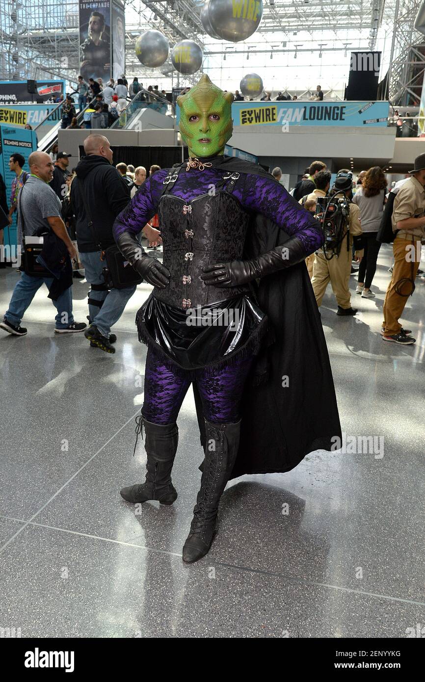 Attendees dress up in costume characters as they attend the 2019 New ...