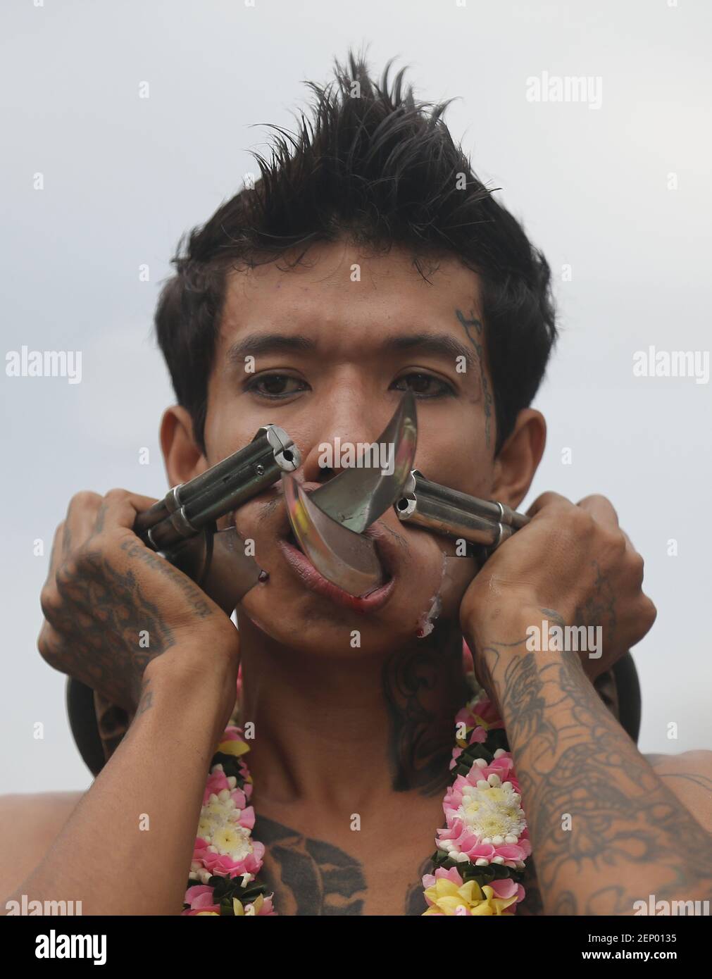 (EDITORS NOTE: Image contains graphic content.) A devotee of the ...