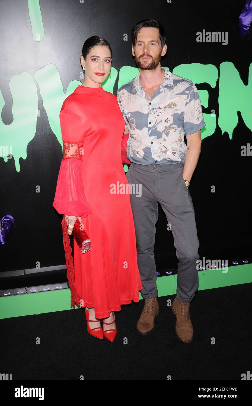 Lizzy Caplan (L) and Tom Riley attend the Huluween Celebration held at ...