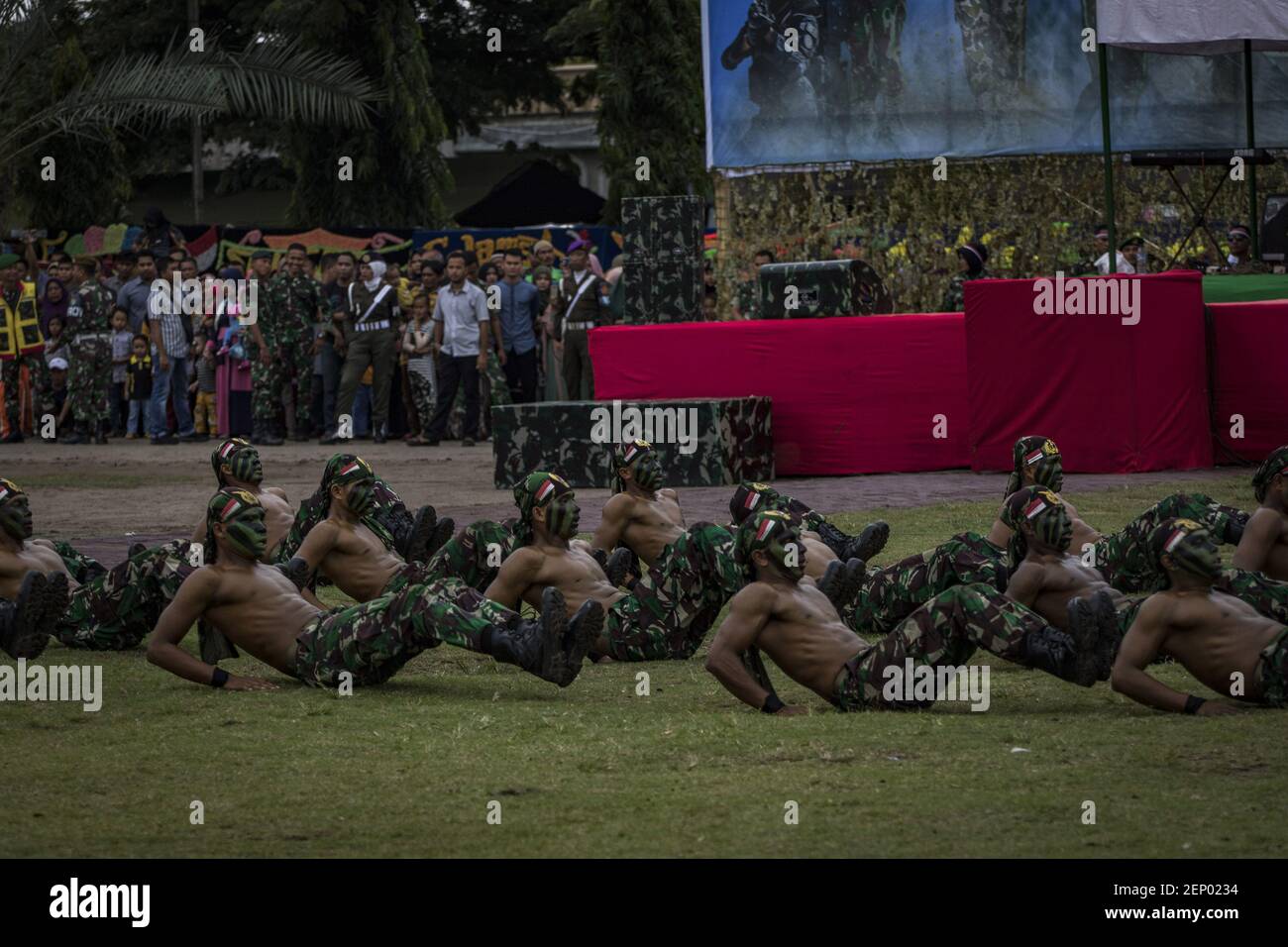 Indonesian Armed Forces perform a movement to tighten the thigh and leg ...