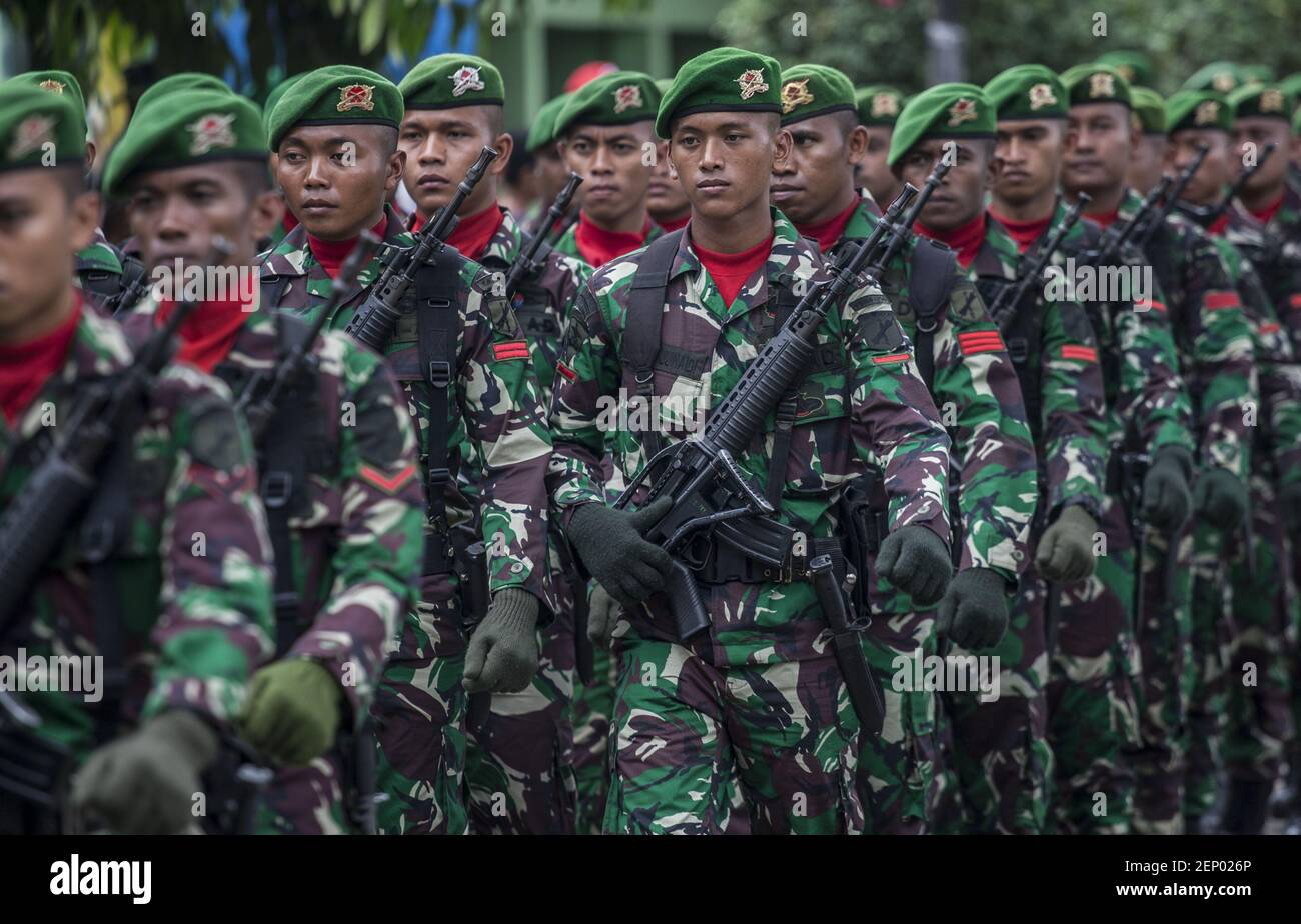 Indonesia army take part in a parade to mark the 74th anniversary of ...