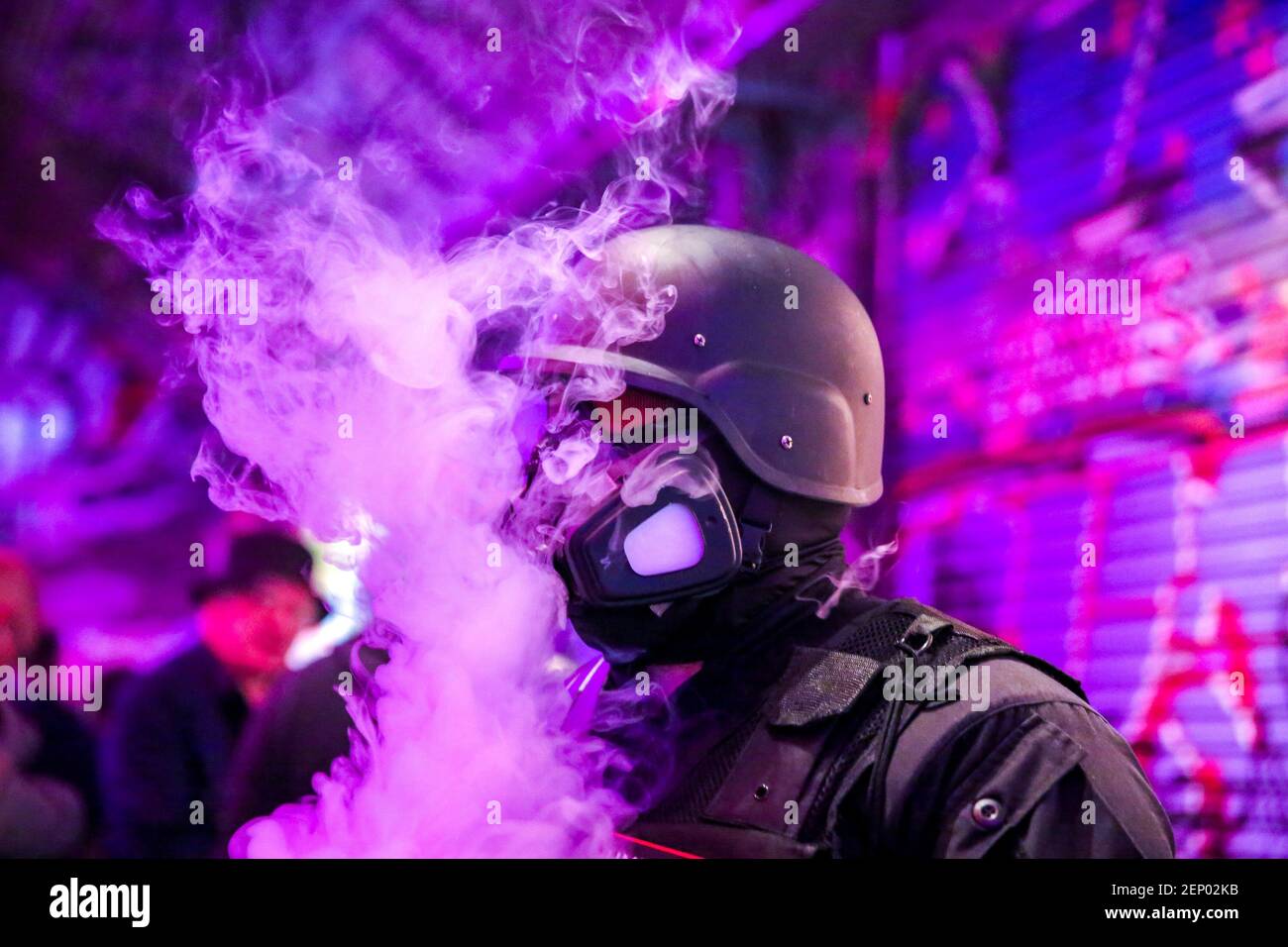 A man seen wearing a mask while smoking as he takes part in World ...