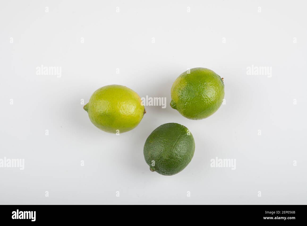 Fresh ripe lime fruit isolated on white background Stock Photo - Alamy