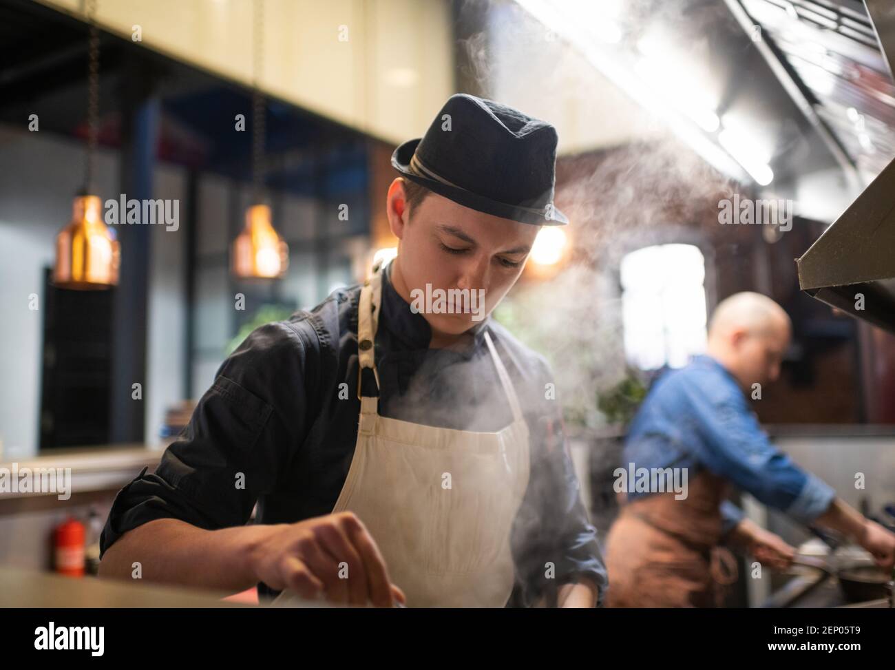 Young guy with hat hi-res stock photography and images - Alamy