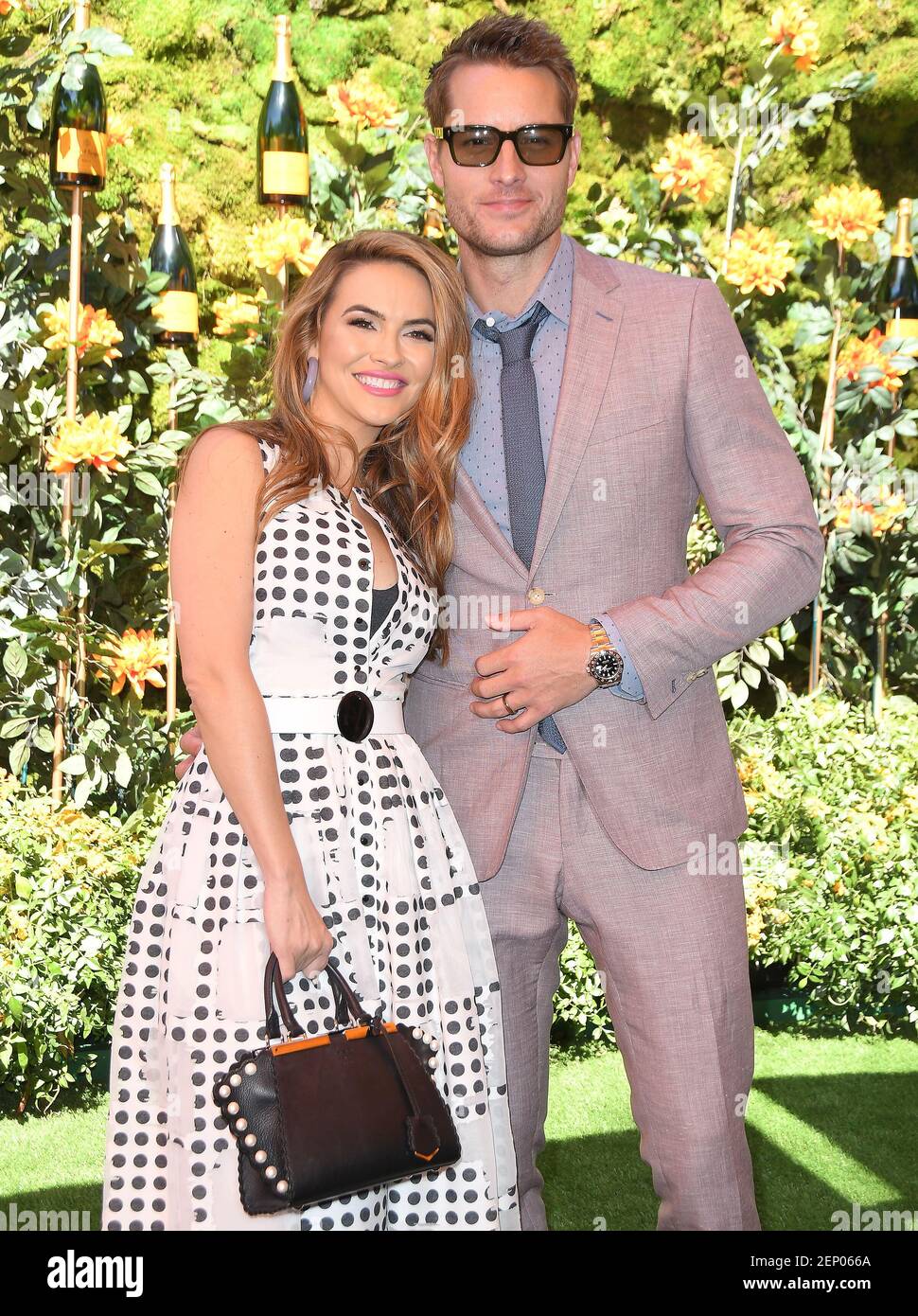 (L-R) Chrishell Hartley and Justin Hartley at the 10th Annual Veuve ...