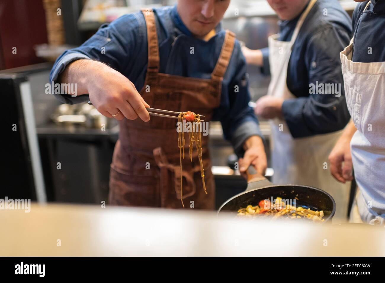 Culinary tongs hi-res stock photography and images - Alamy
