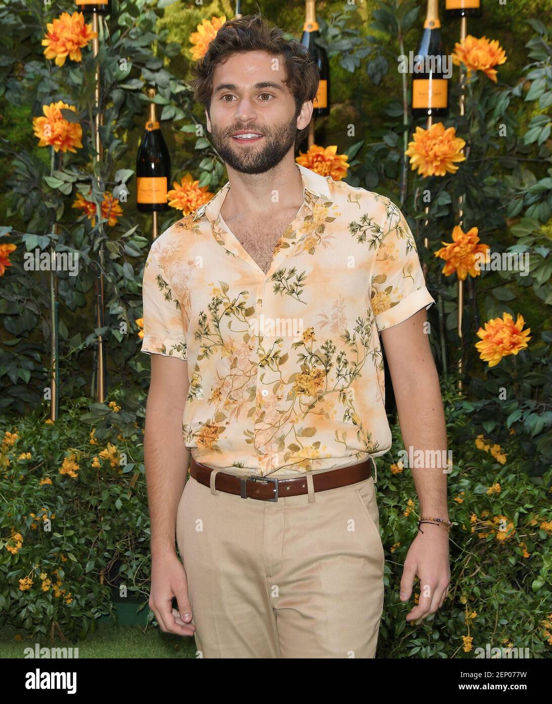 Jake Borelli arrives at the 10th Annual Veuve Clicquot Polo Classic Los ...