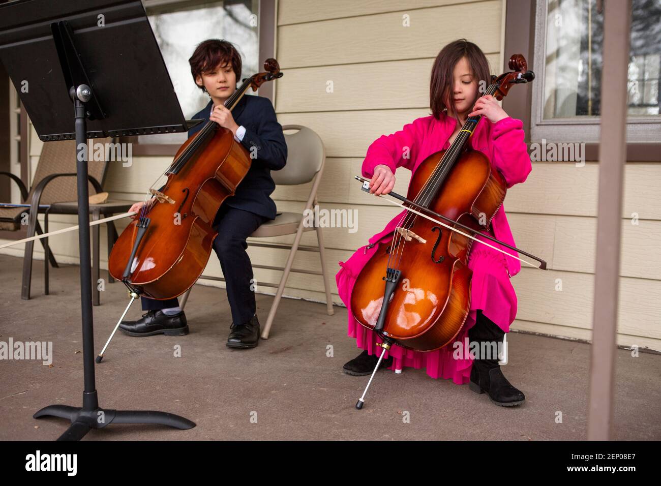 Boy playing cello hi-res stock photography and images - Alamy