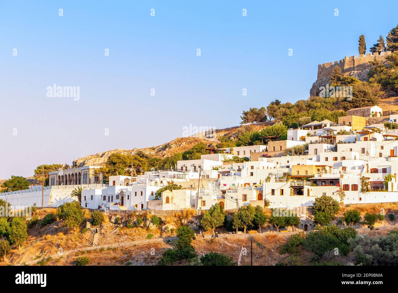 Sunset landscape of the old town of Lindos on Rhodes, Greece Stock ...