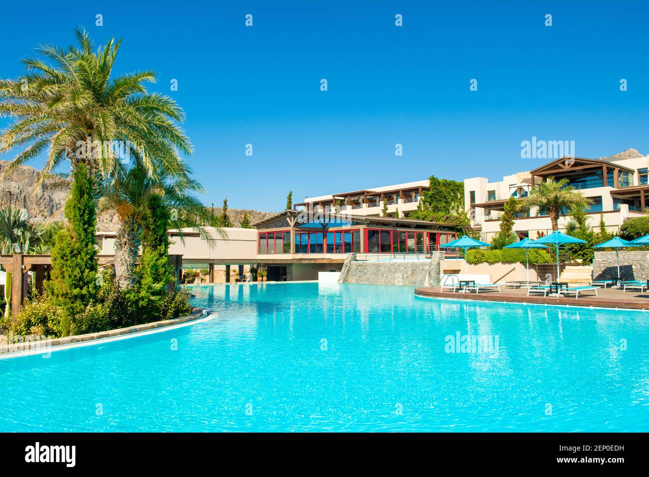 Rhodes, Greece - 18 July 2019: Outdoor pool area in a luxury hotel on ...