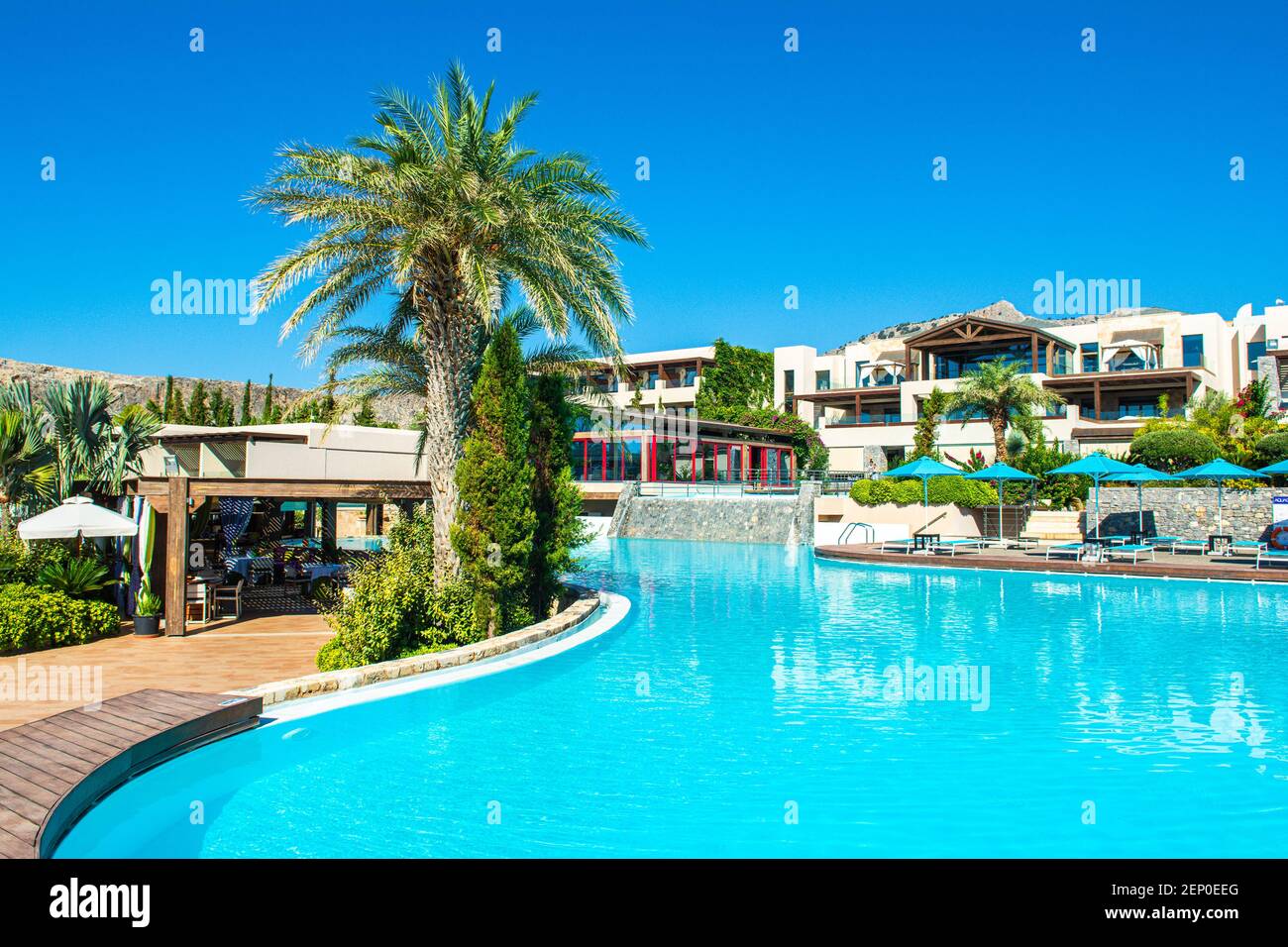 Rhodes, Greece - 18 July 2019: Outdoor pool area in a luxury hotel on ...