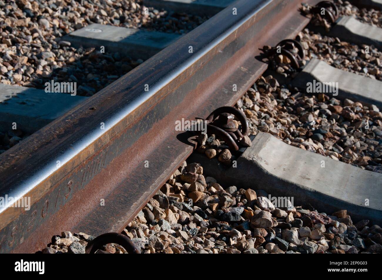 Rail on concrete ties in a rail yard Stock Photo - Alamy