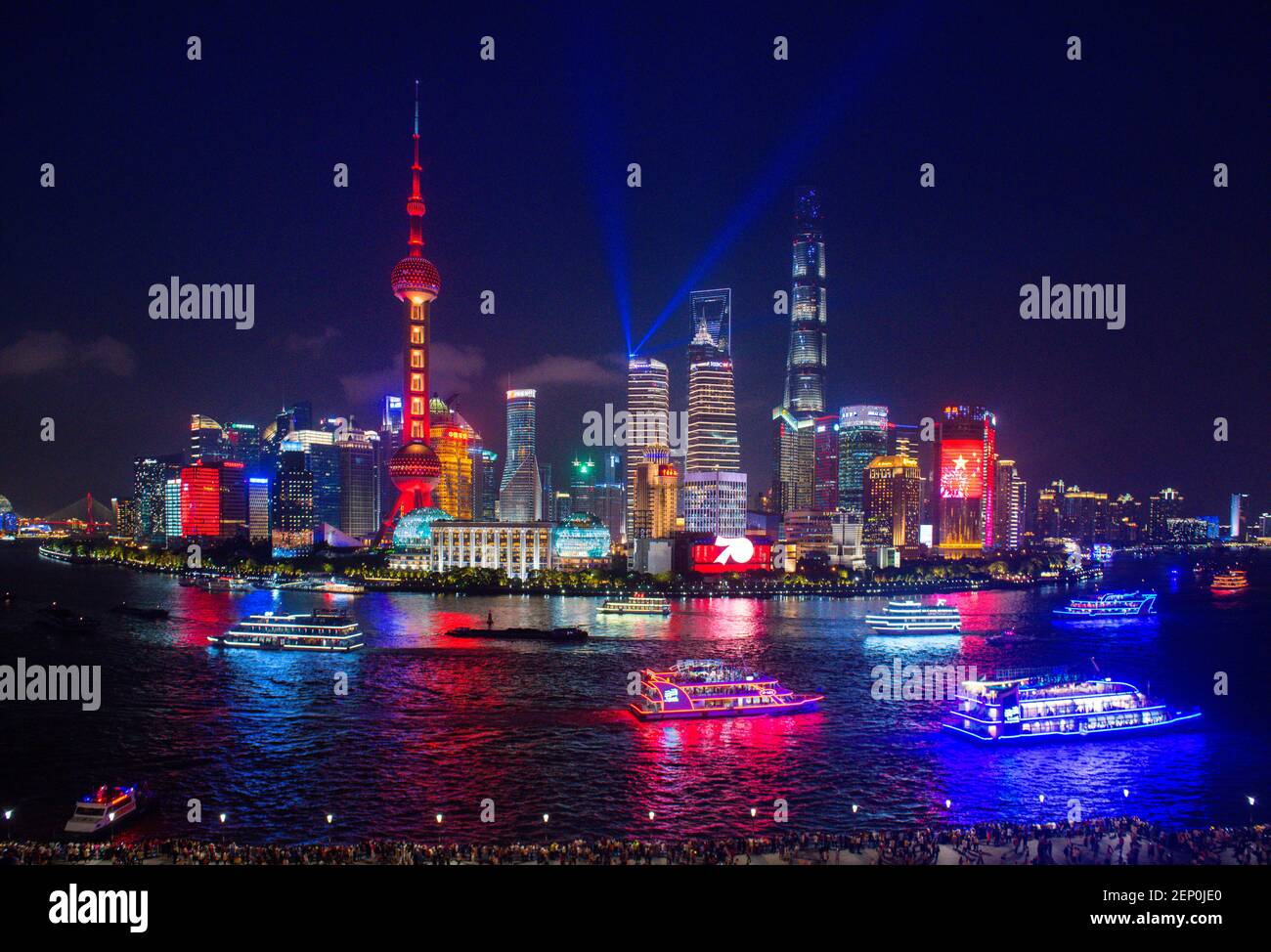 A grand light show is performed at the Bund with local landmarks as ...
