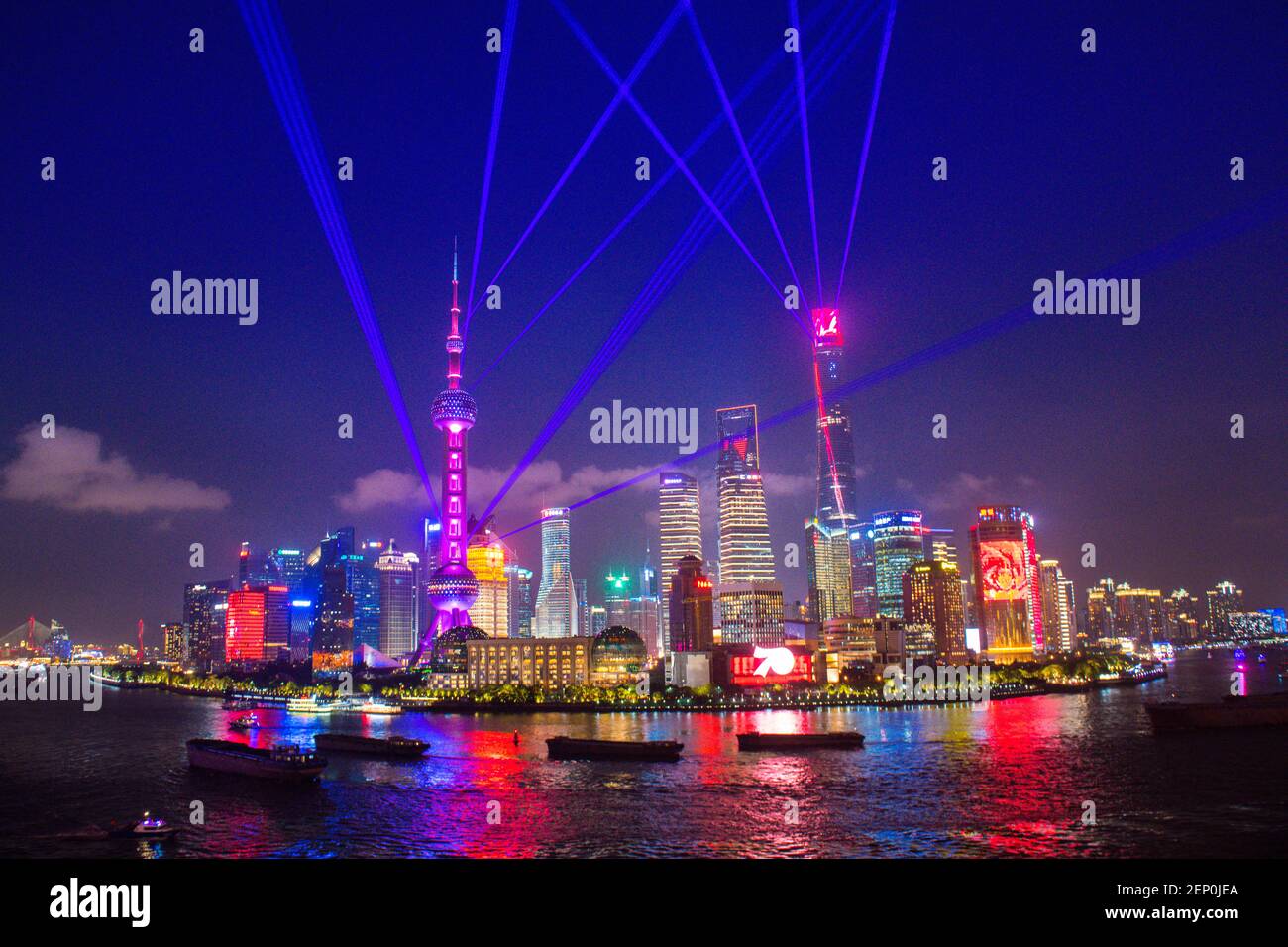 A grand light show is performed at the Bund with local landmarks as ...