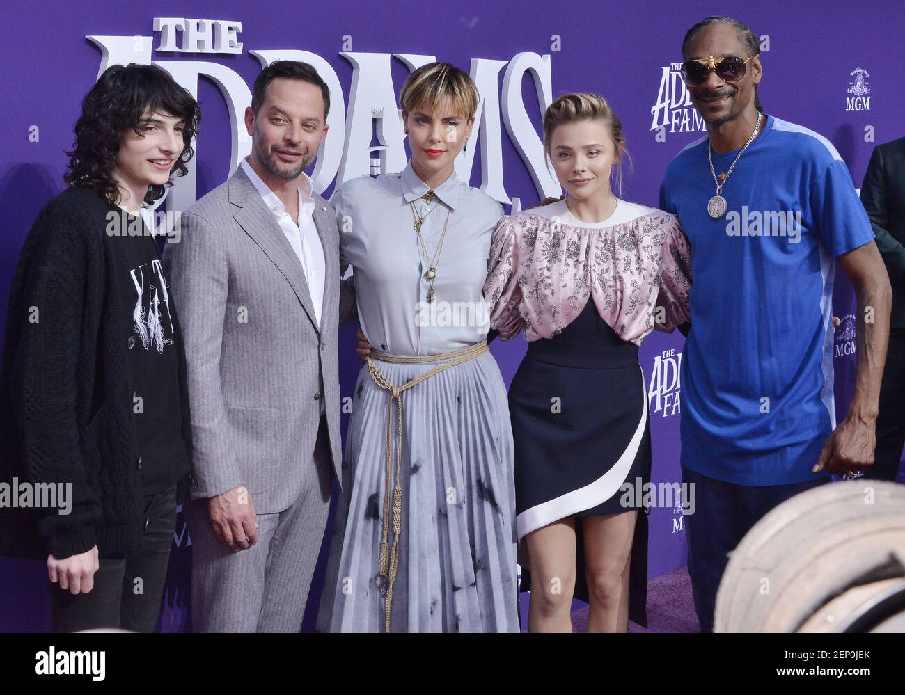 (L-R) THE ADDAMS FAMILY Cast - Finn Wolfhard, Nick Kroll, Charlize ...