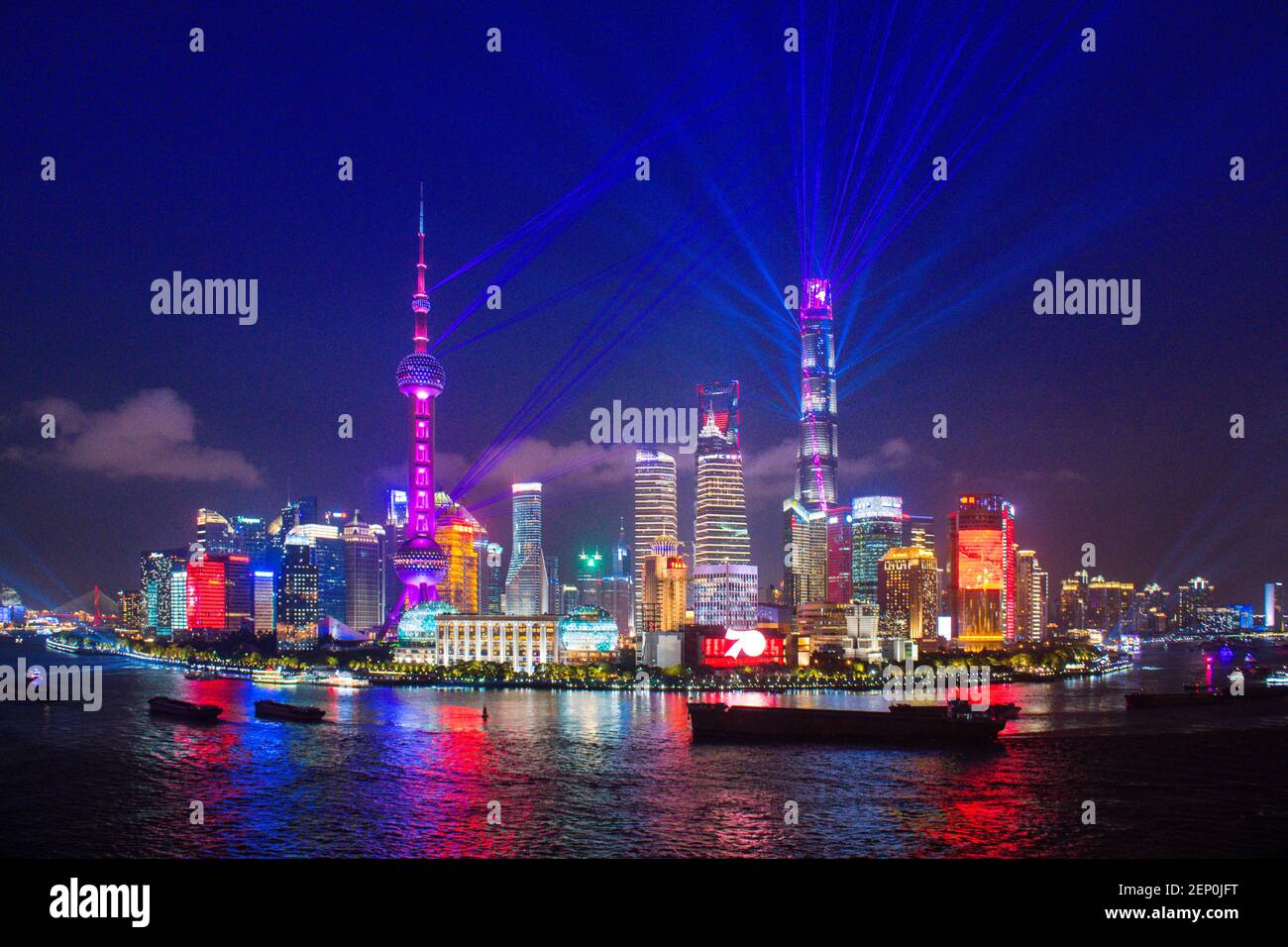 A grand light show is performed at the Bund with local landmarks as ...