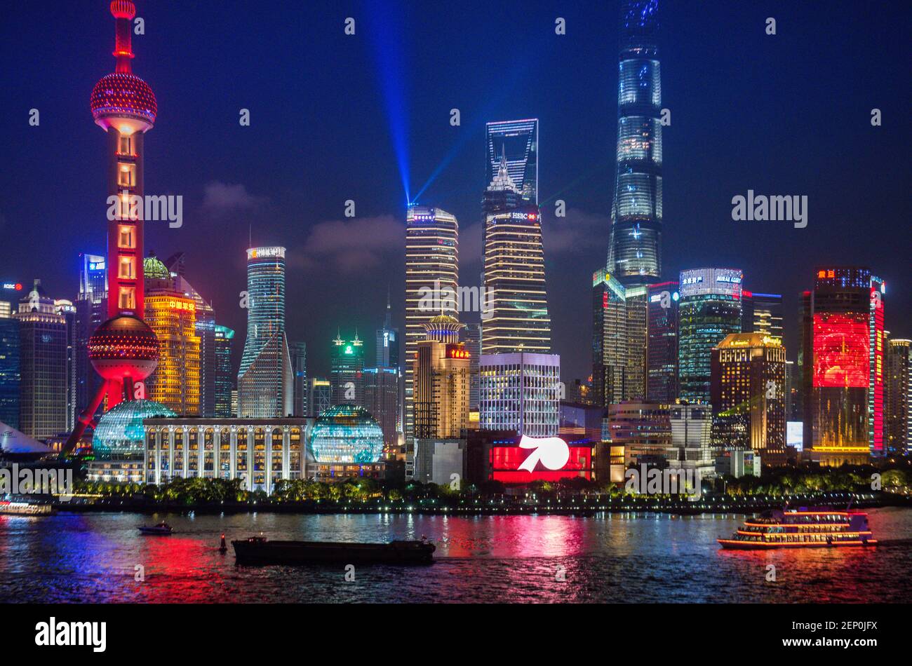 A grand light show is performed at the Bund with local landmarks as ...