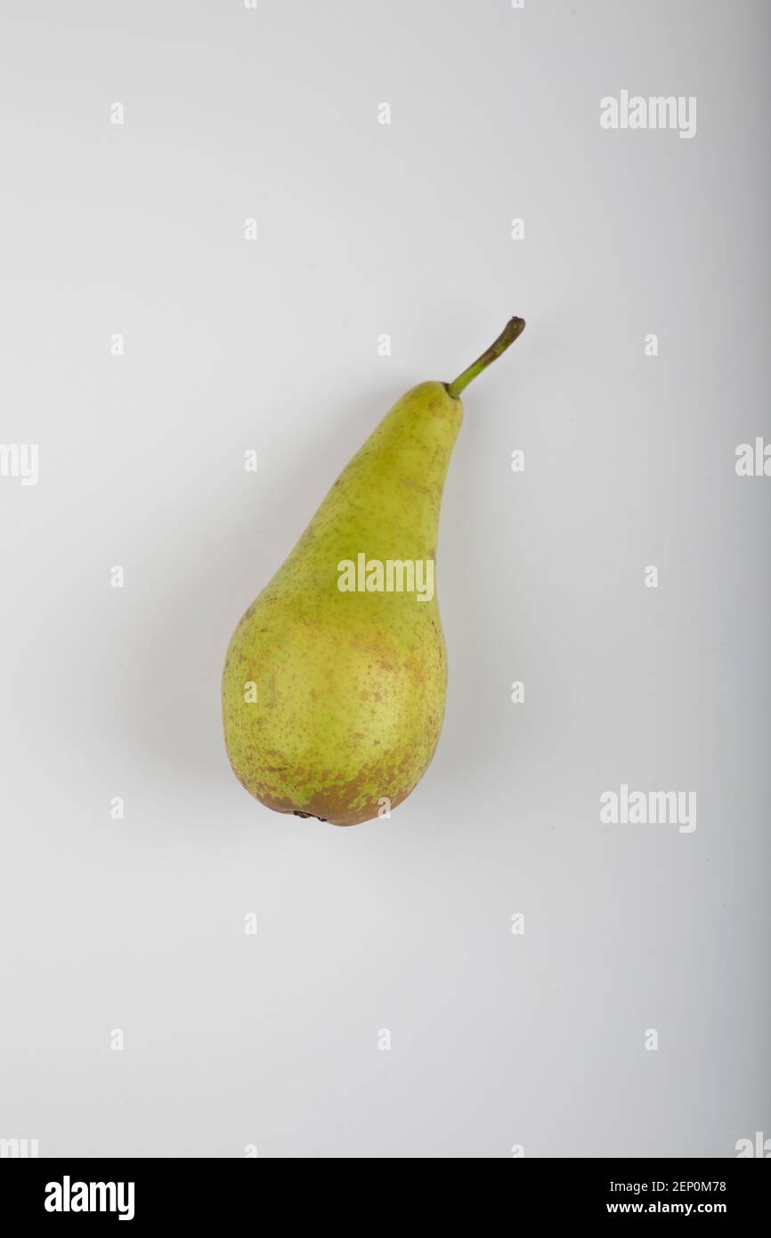 Single whole green pear isolated on white background Stock Photo - Alamy