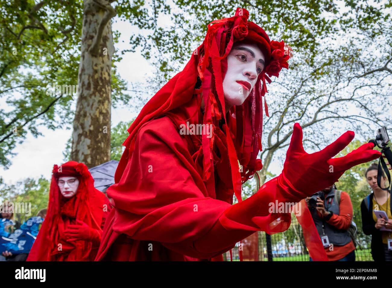 The XR Red Rebel Brigade held a solemn procession in Battery Park on ...