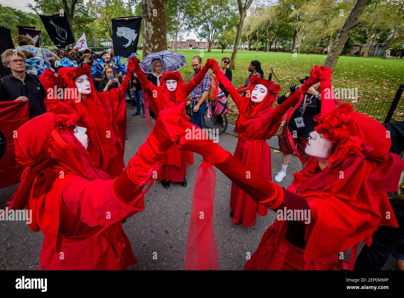 The XR Red Rebel Brigade held a solemn procession in Battery Park on ...