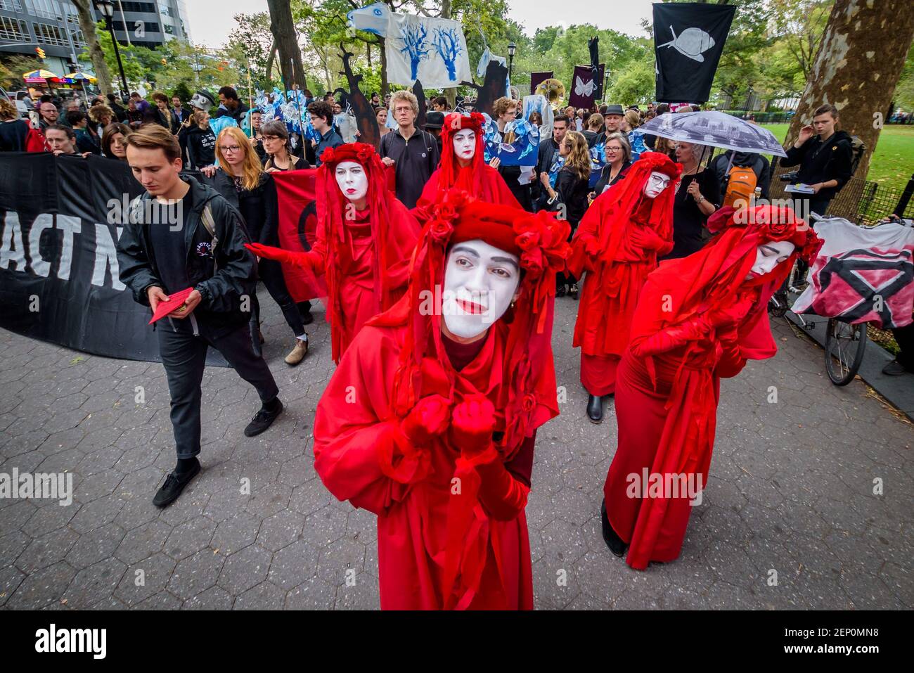 The XR Red Rebel Brigade held a solemn procession in Battery Park on ...