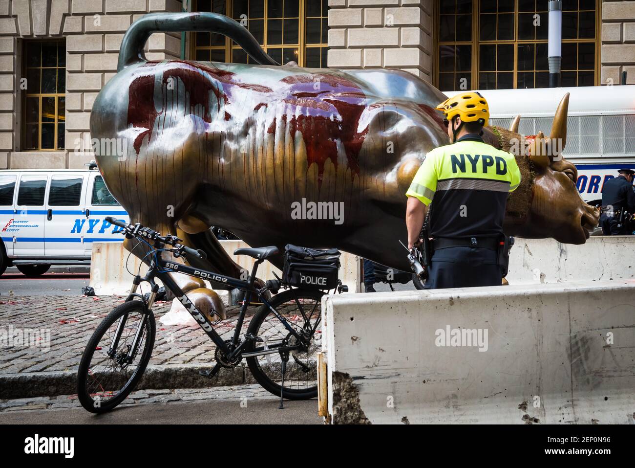 The Charging Bull covered in fake blood after Extinction Rebellion ...
