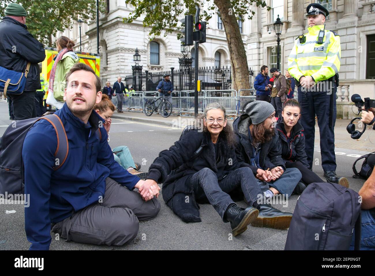 Protesters from Extinction Rebellion movement glued themselves during ...