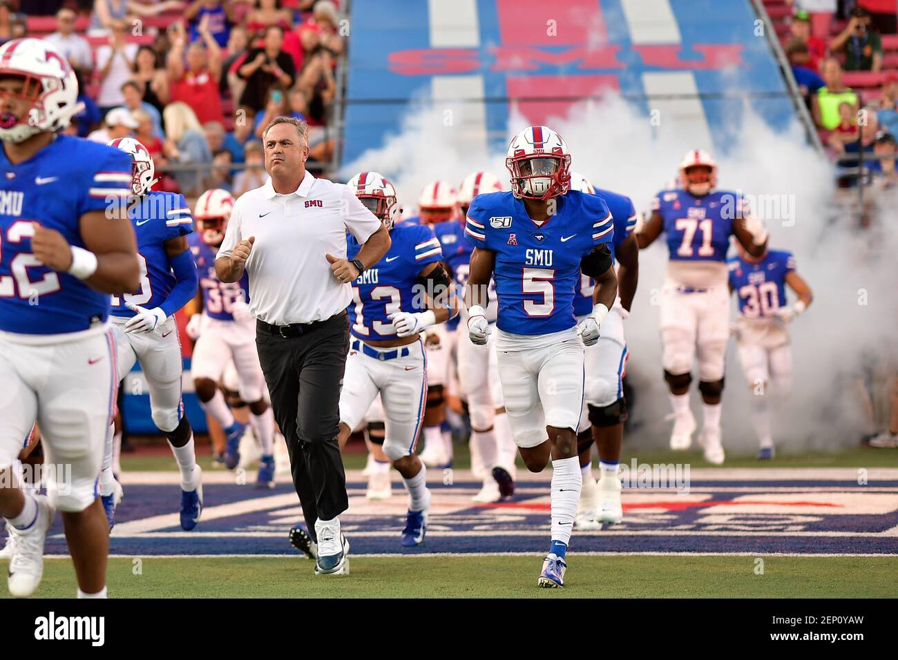 SMU Mustang players and Southern Methodist Mustangs head coach Sonny ...