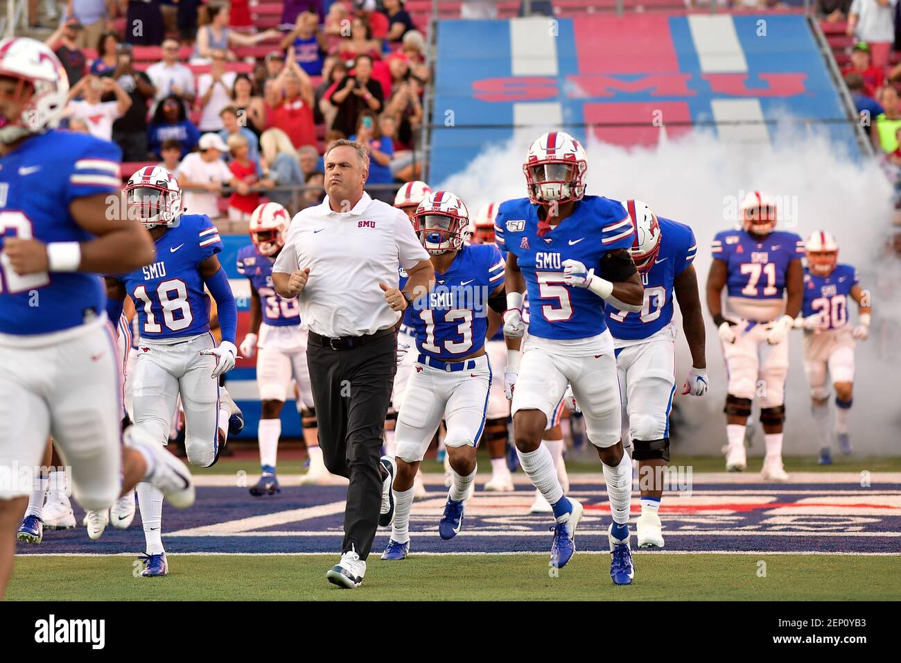 SMU Mustang players and Southern Methodist Mustangs head coach Sonny ...